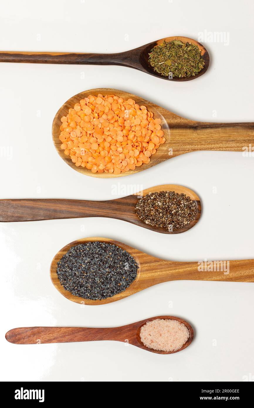 Himalayan pink salt, poppy seeds, chia seeds, pink lentils and oregano ...