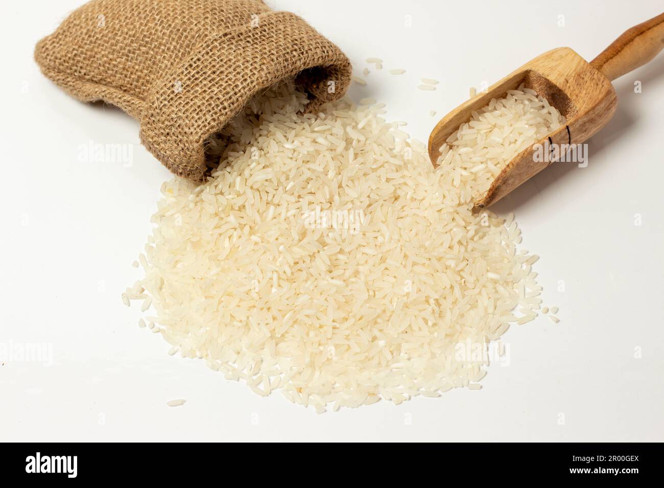 white background - spilled rice grains Stock Photo - Alamy
