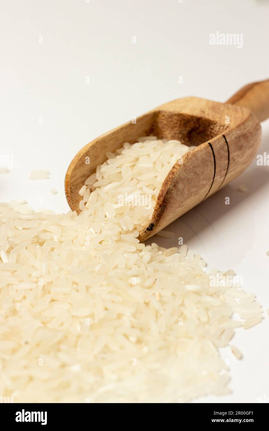 white background - spilled rice grains Stock Photo - Alamy