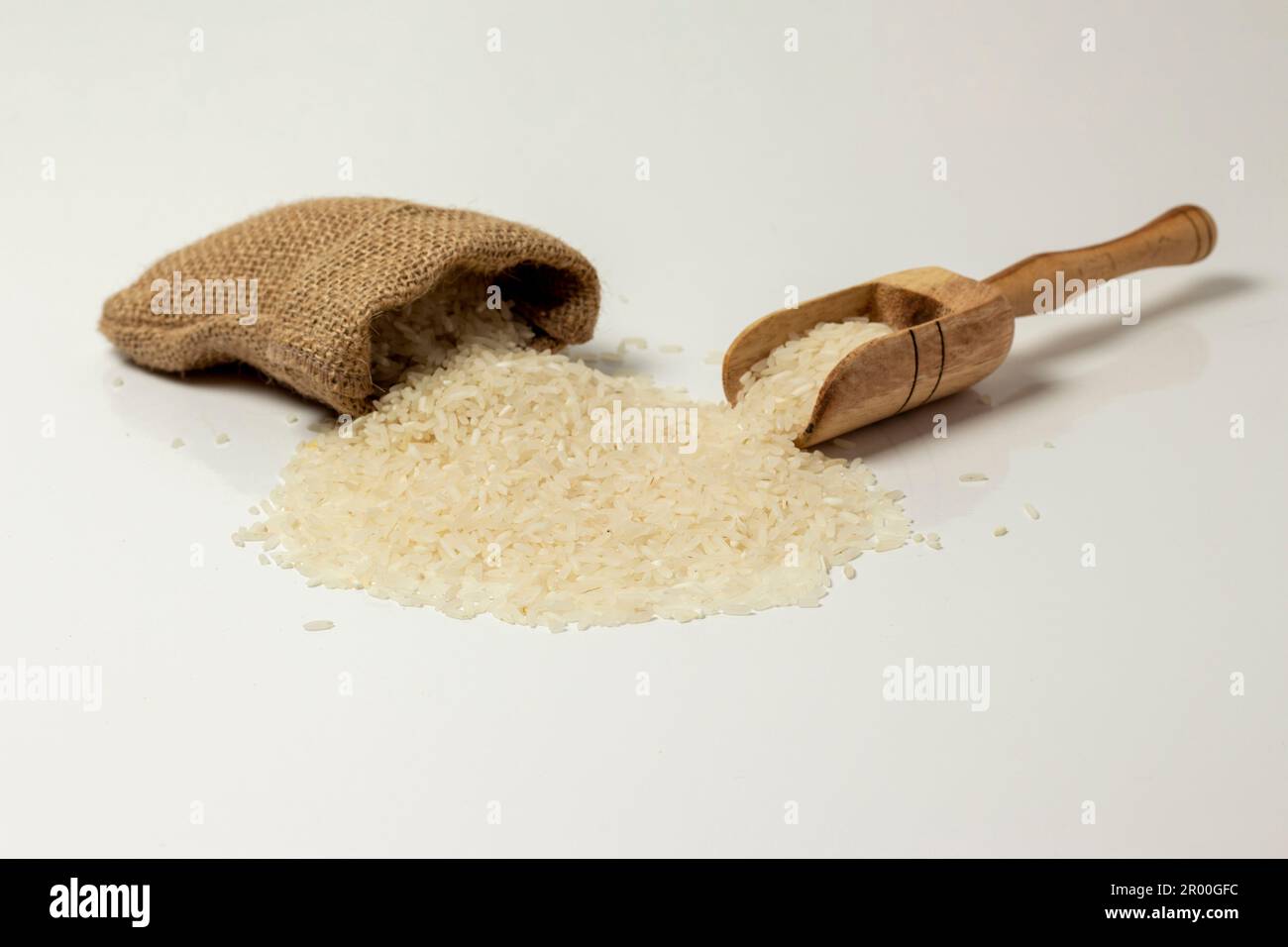 white background - spilled rice grains Stock Photo - Alamy