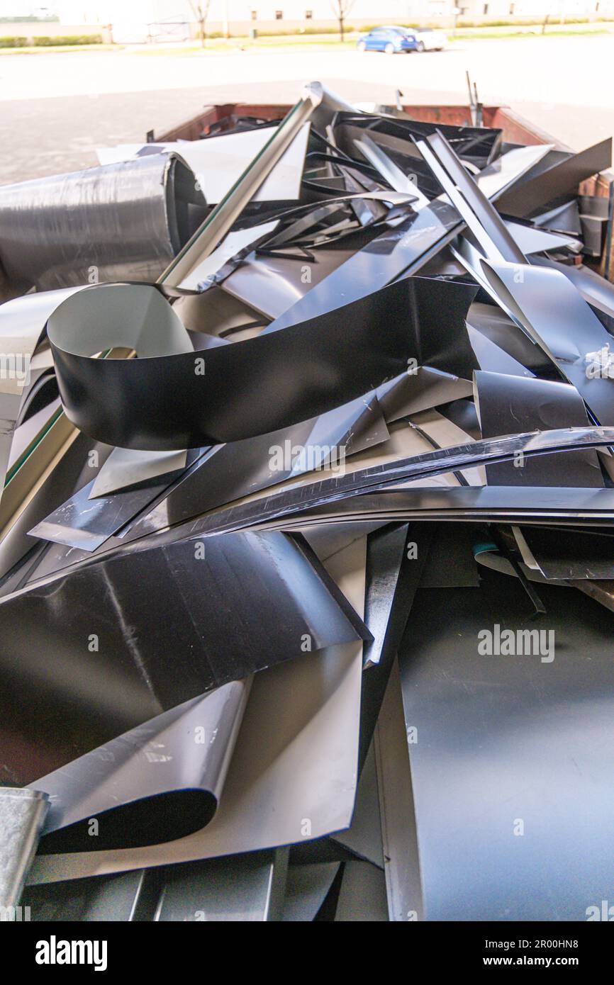 metal and steel waste in a bin for recycling Stock Photo - Alamy