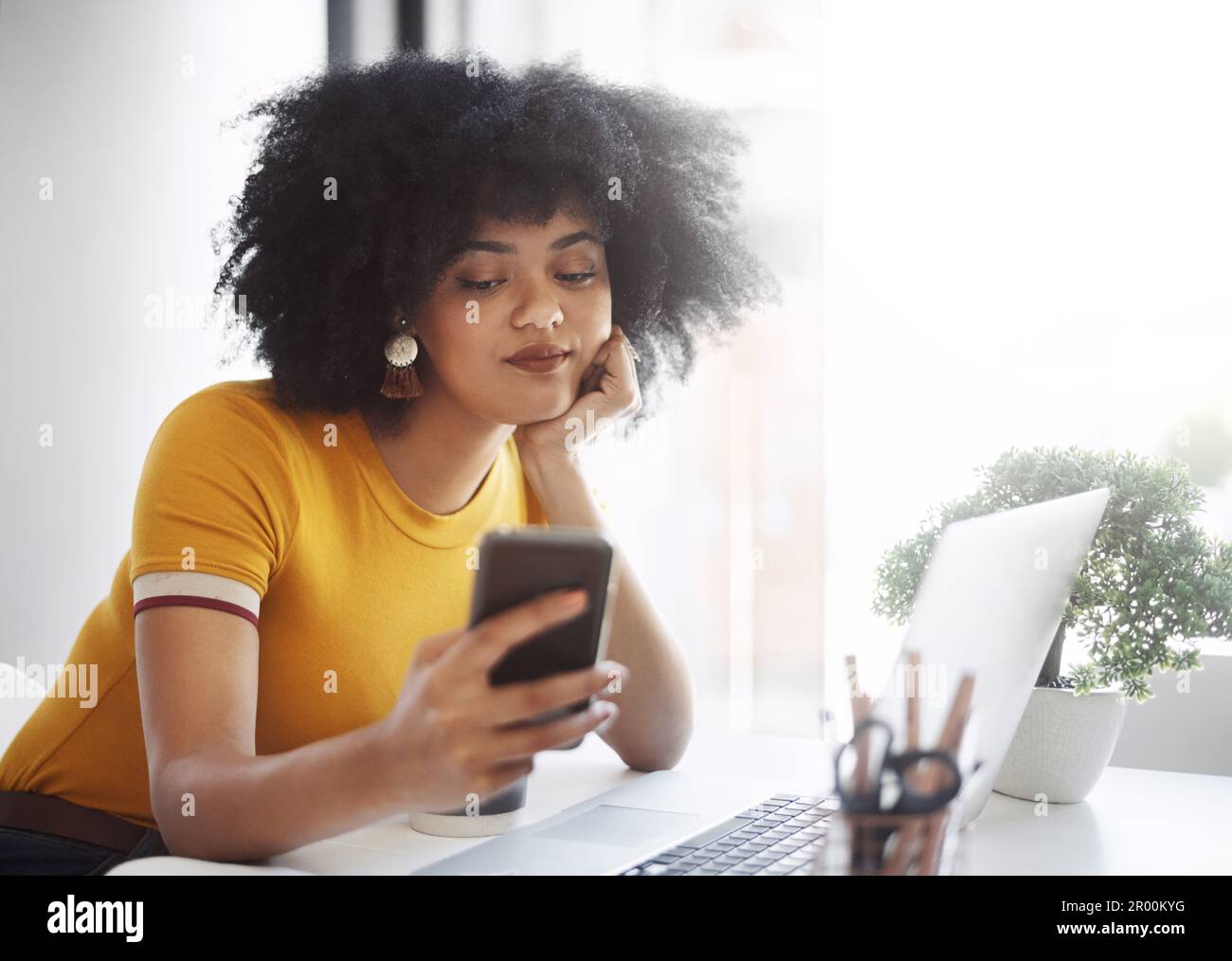 Phone, laptop and bored business woman on social media, browse or ...