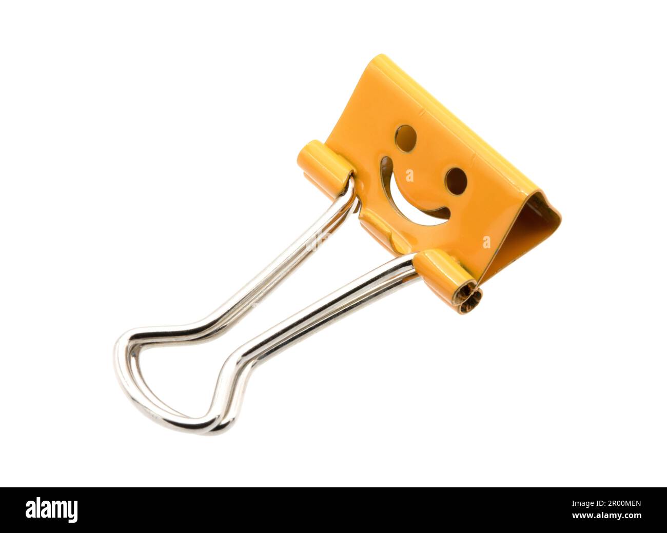 Smile orange binder clip isolated on white background Stock Photo - Alamy