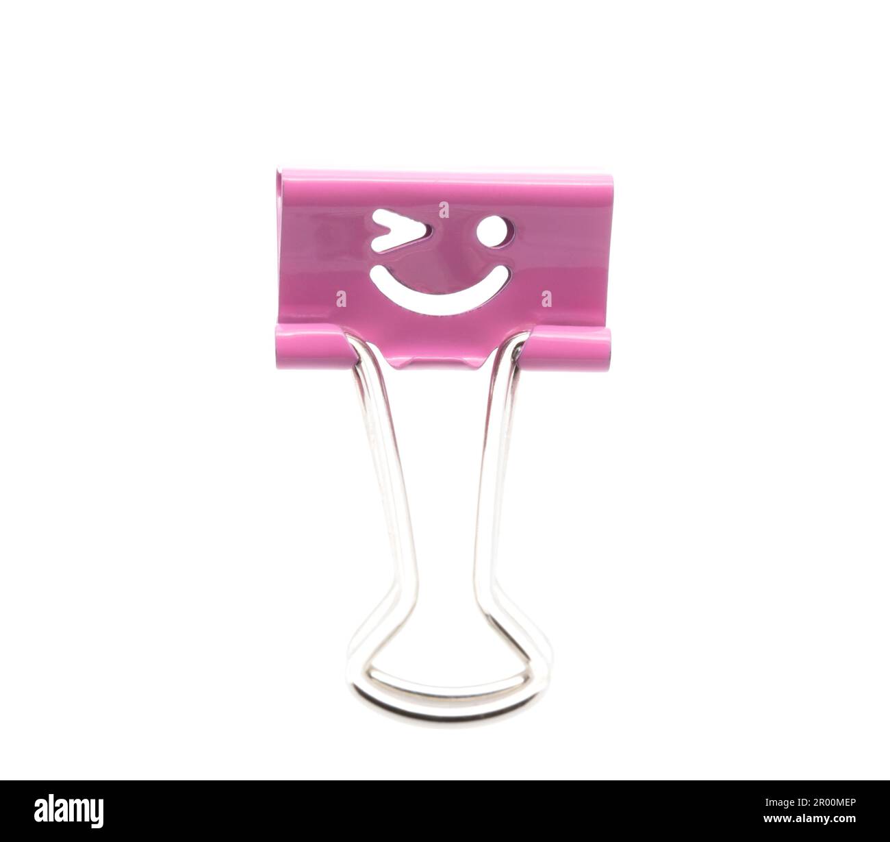 Smile pink binder clip isolated on white background Stock Photo - Alamy