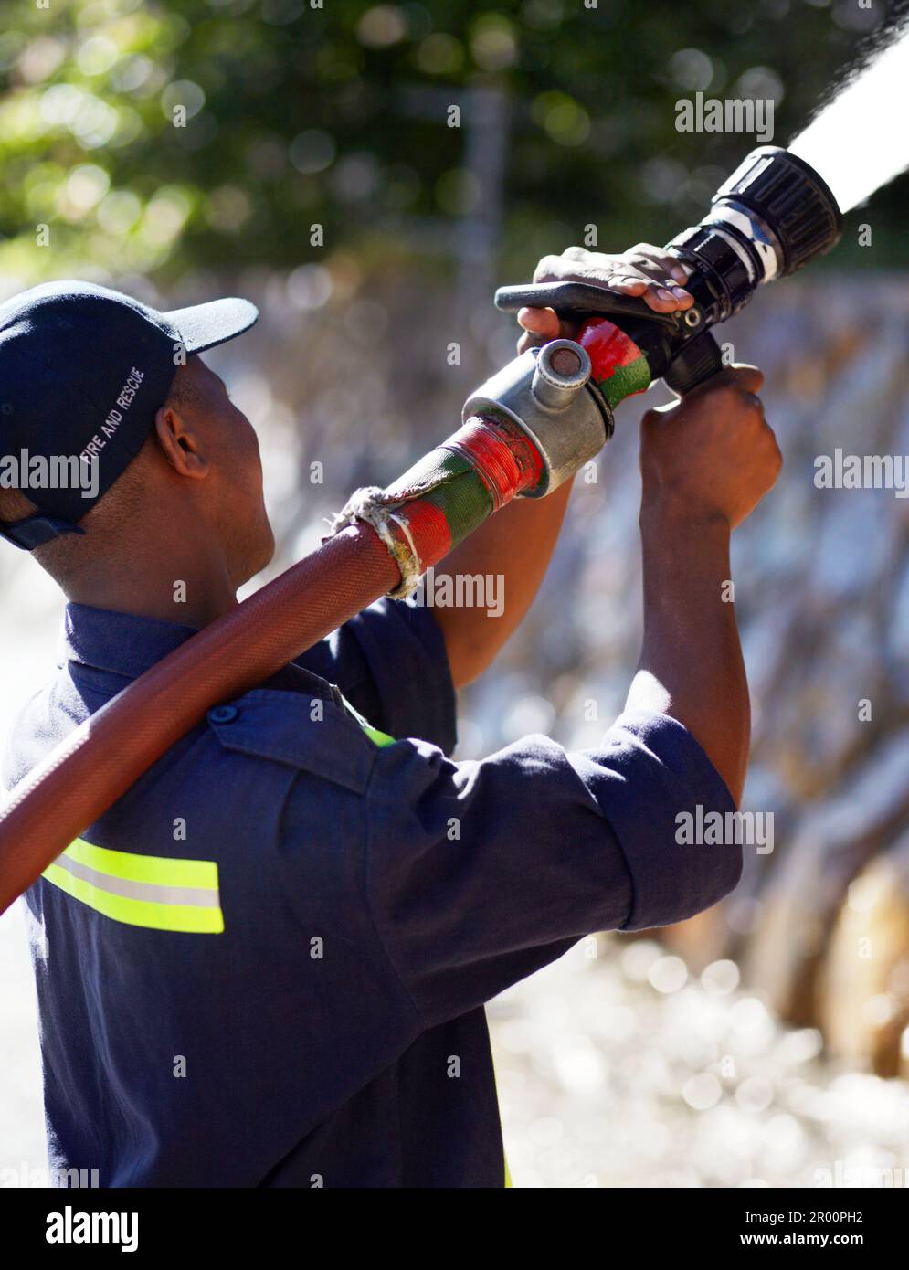 Fireman using water hi-res stock photography and images - Alamy