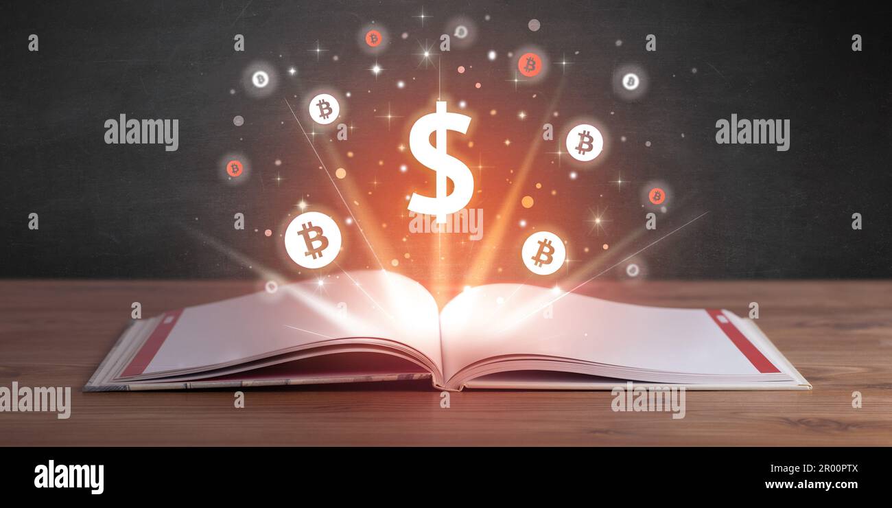 Open book with currency icons above Stock Photo - Alamy