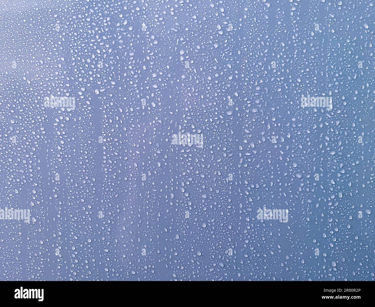 Close up abstract texture background of water droplets on a smooth ...