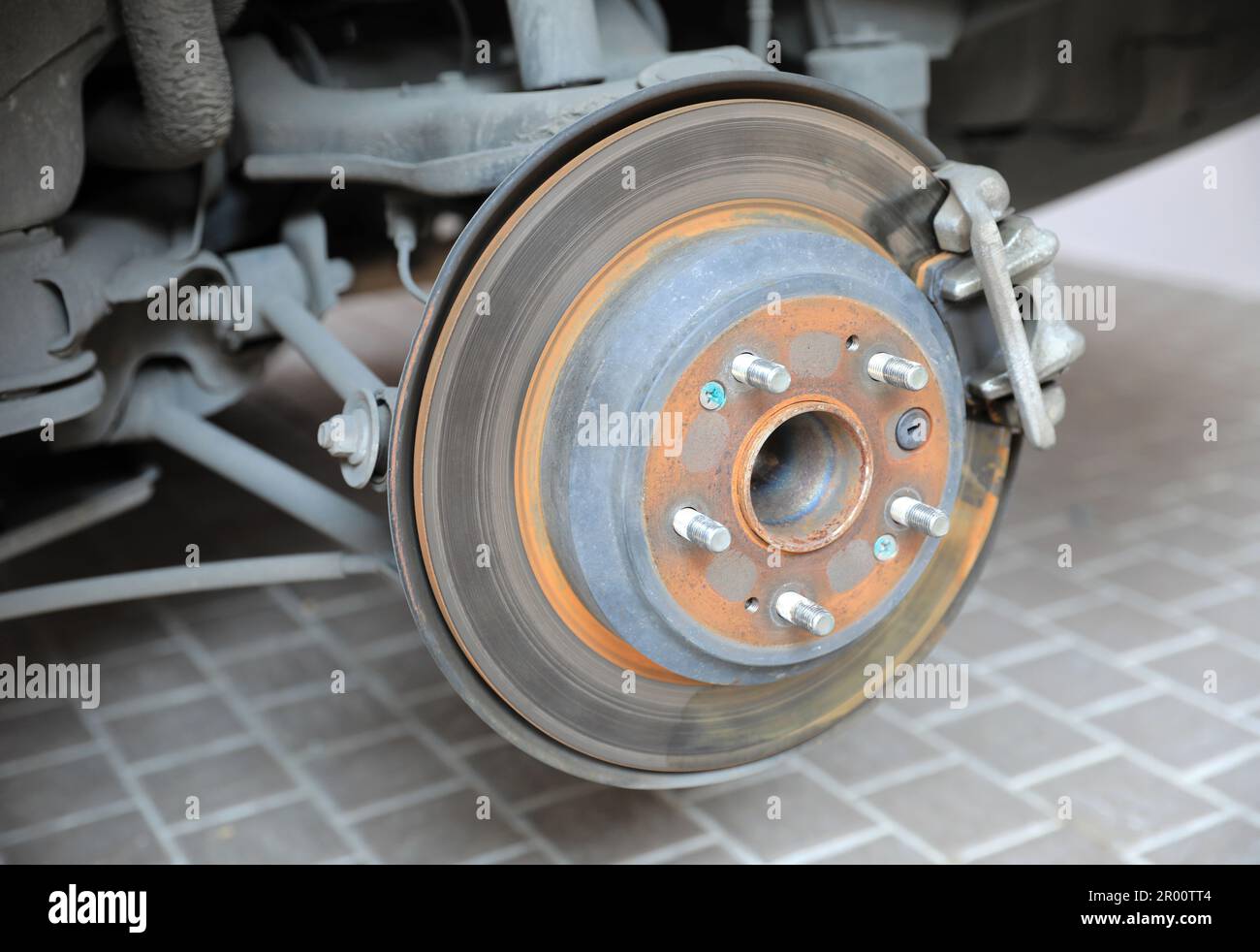 Disk brake and caliper in process of new tire replacement Stock Photo ...