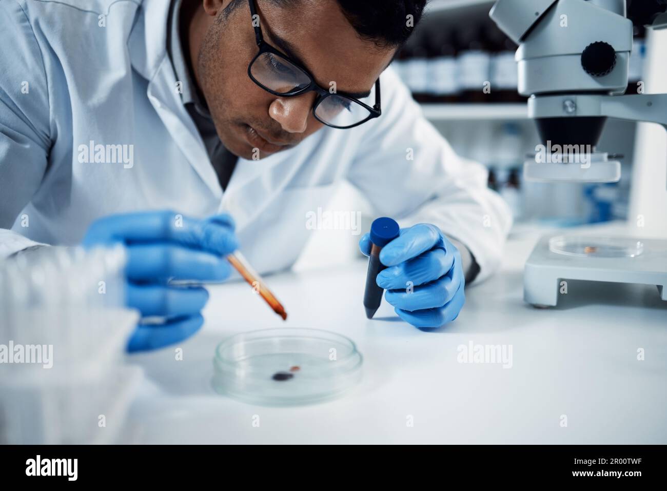 Blood tells the story best. a young scientist conducting medical ...