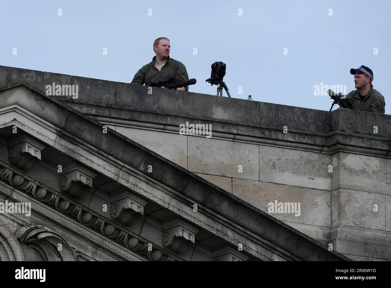 Snipers guard on the roof of Buckingham Palace prior to the coronation ...