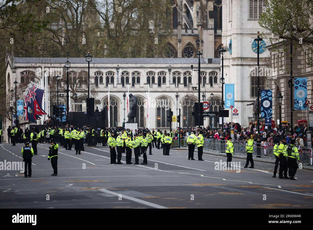 Police officers line the streets ahead of the coronation of King ...