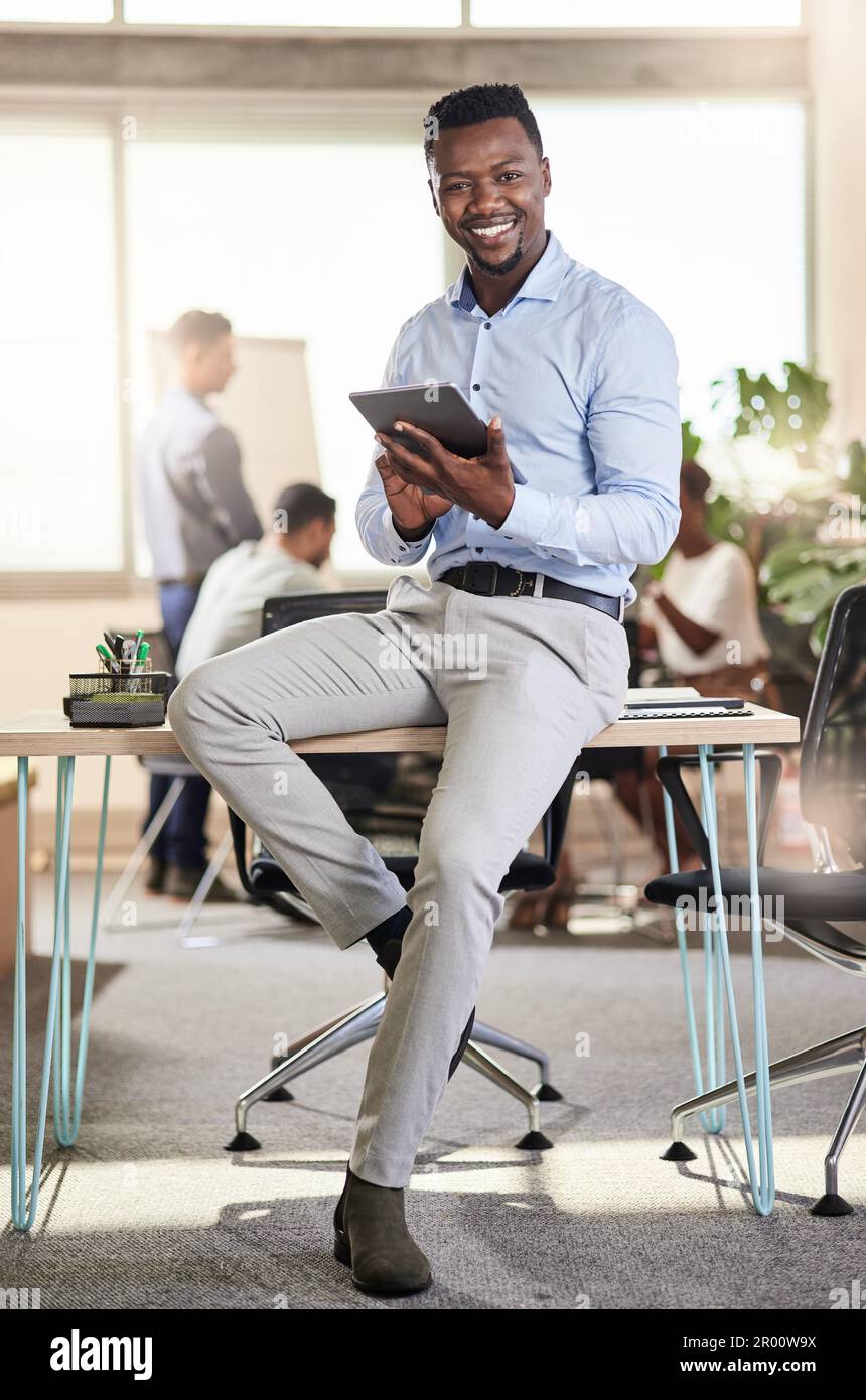 This will take us to the next level. a young businessman using his ...