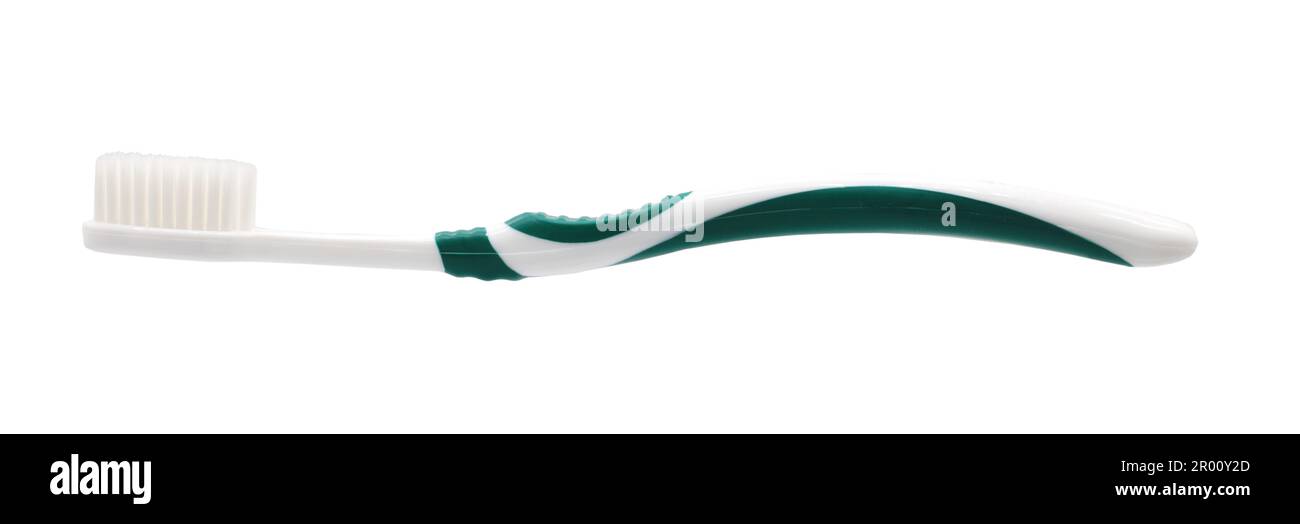 Green toothbrush isolated on white background Stock Photo - Alamy