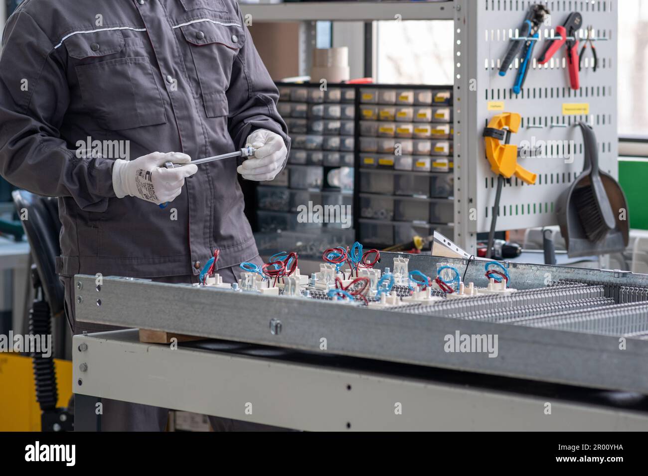 Perm, Russia - April 25, 2023: worker operates an automatic production ...