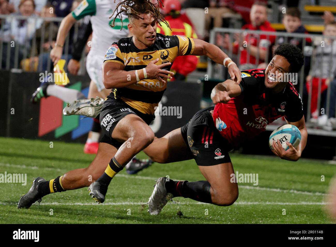 Western Force halfback Issak Fines-Leleiwasa in action against ...