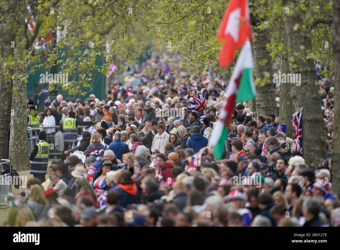 The crowd gather along The Mall, ahead of the coronation ceremony of ...