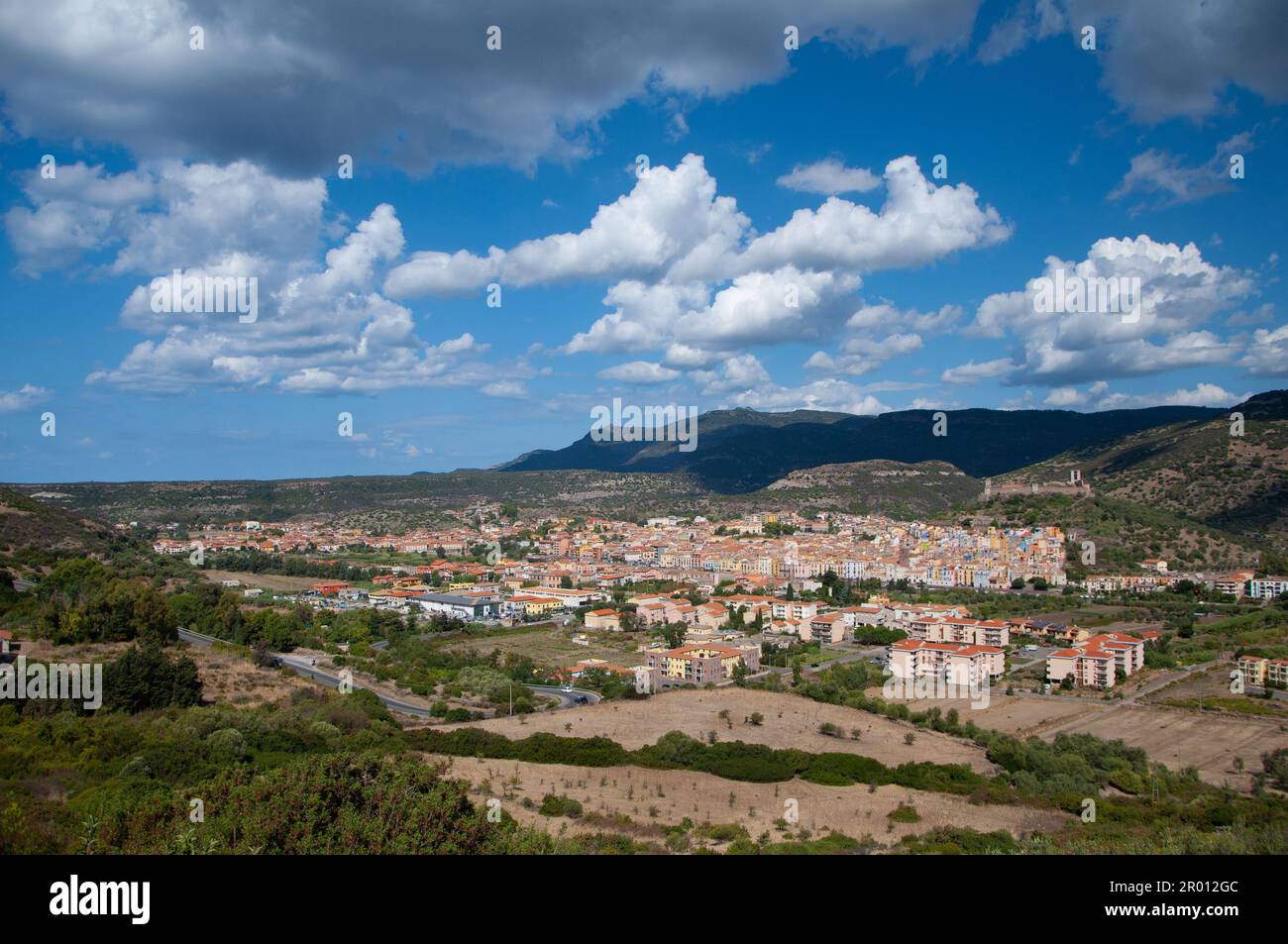 view of the colorful old town and Malaspina Castle of Bosa in the green ...