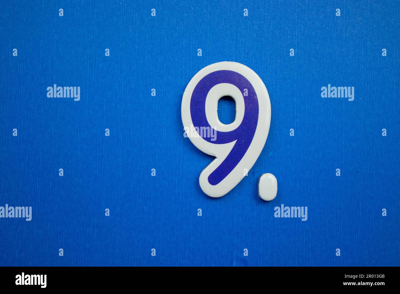The number 9 in light blue and white color, placed on a blue background ...