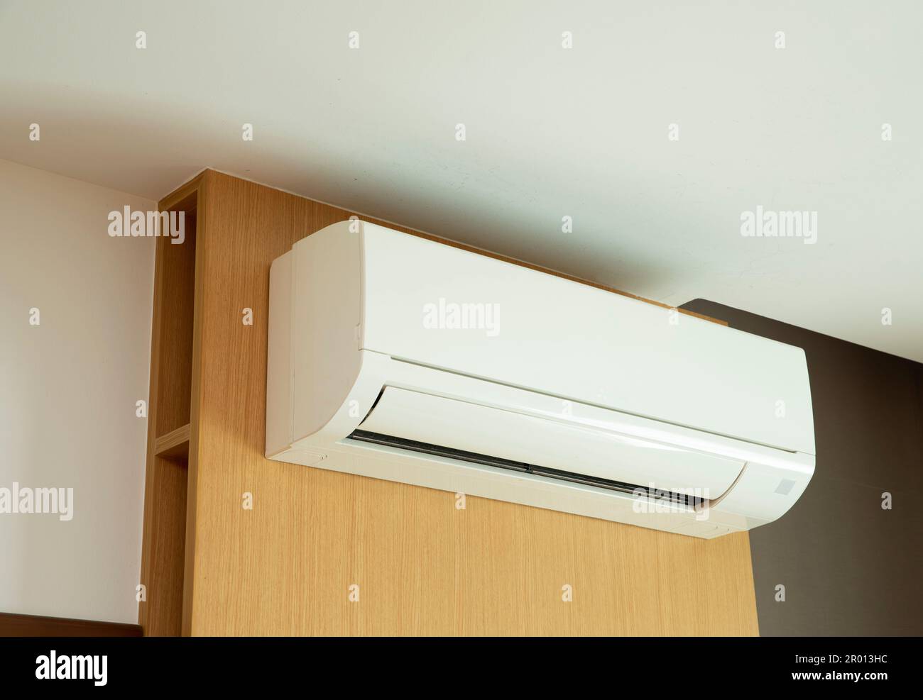 Split air conditioner installed on wooden wall Stock Photo Alamy
