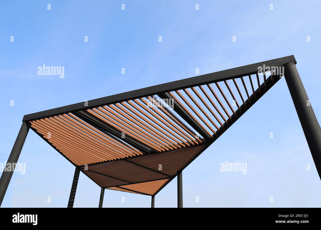 Wooden slats roof with blue sky background. Wooden slat shading structure Stock Photo - Alamy