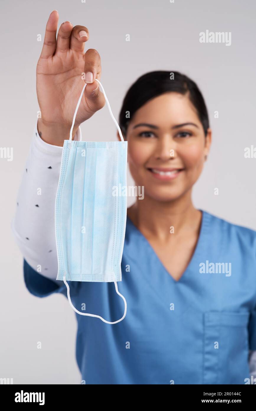 Only doctors truly love life. Portrait of a young doctor holding her ...