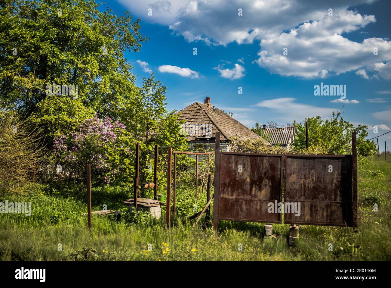 Heavily damaged or destroyed houses in the village of Yampil, Donetsk ...