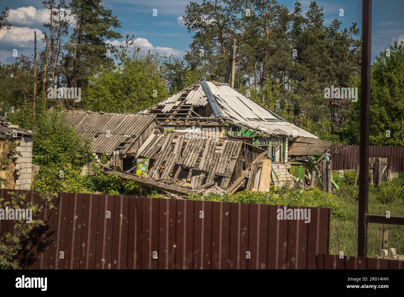 Heavily damaged or destroyed houses in the village of Yampil, Donetsk ...