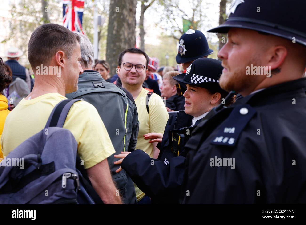 London, UK. 06th May, 2023. Police officers interact with members of ...