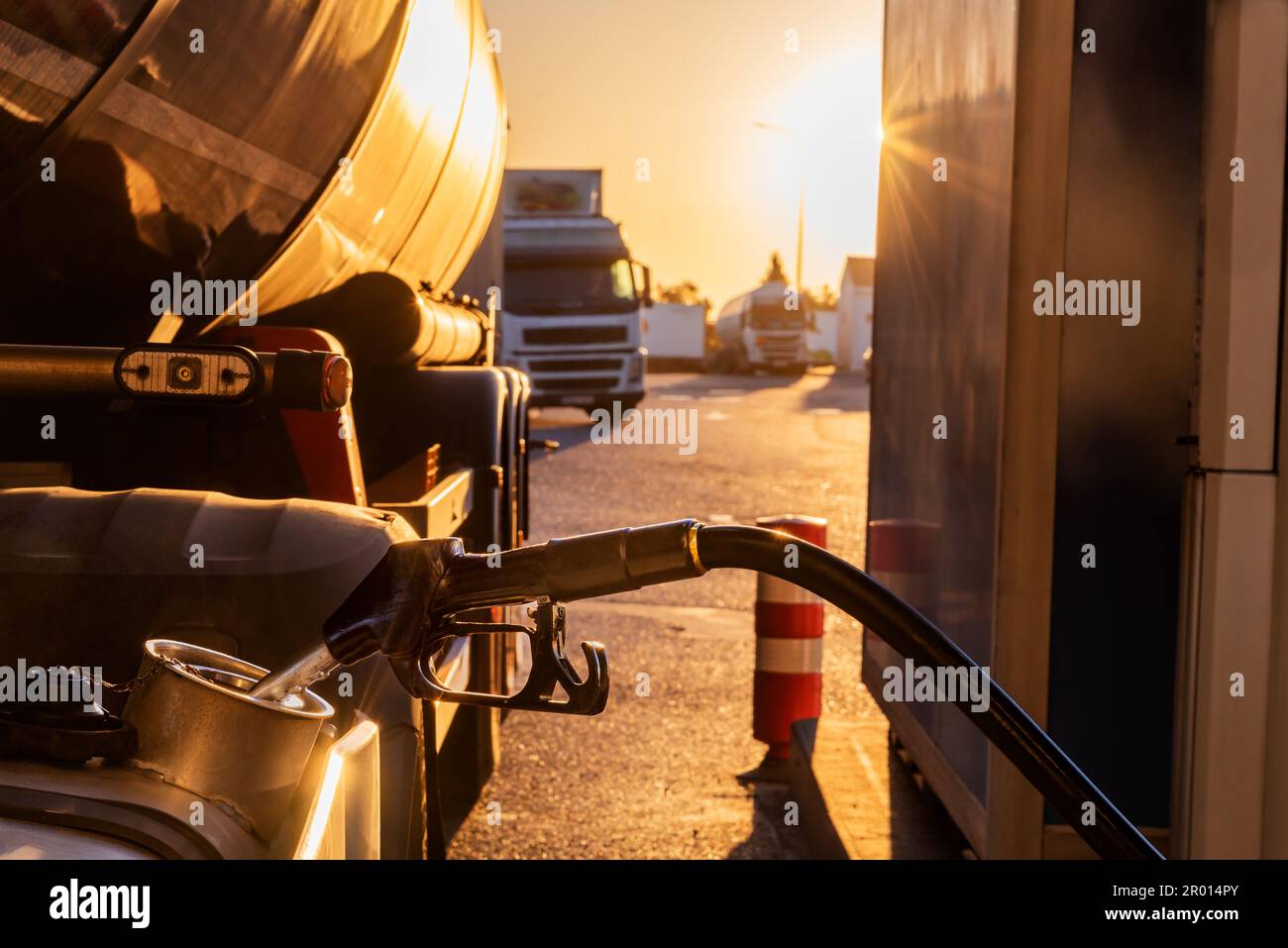 Filling the fuel tank of a truck at a gas station Stock Photo - Alamy