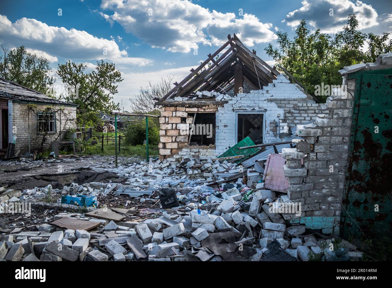 Heavily damaged or destroyed houses in the village of Yampil, Donetsk ...