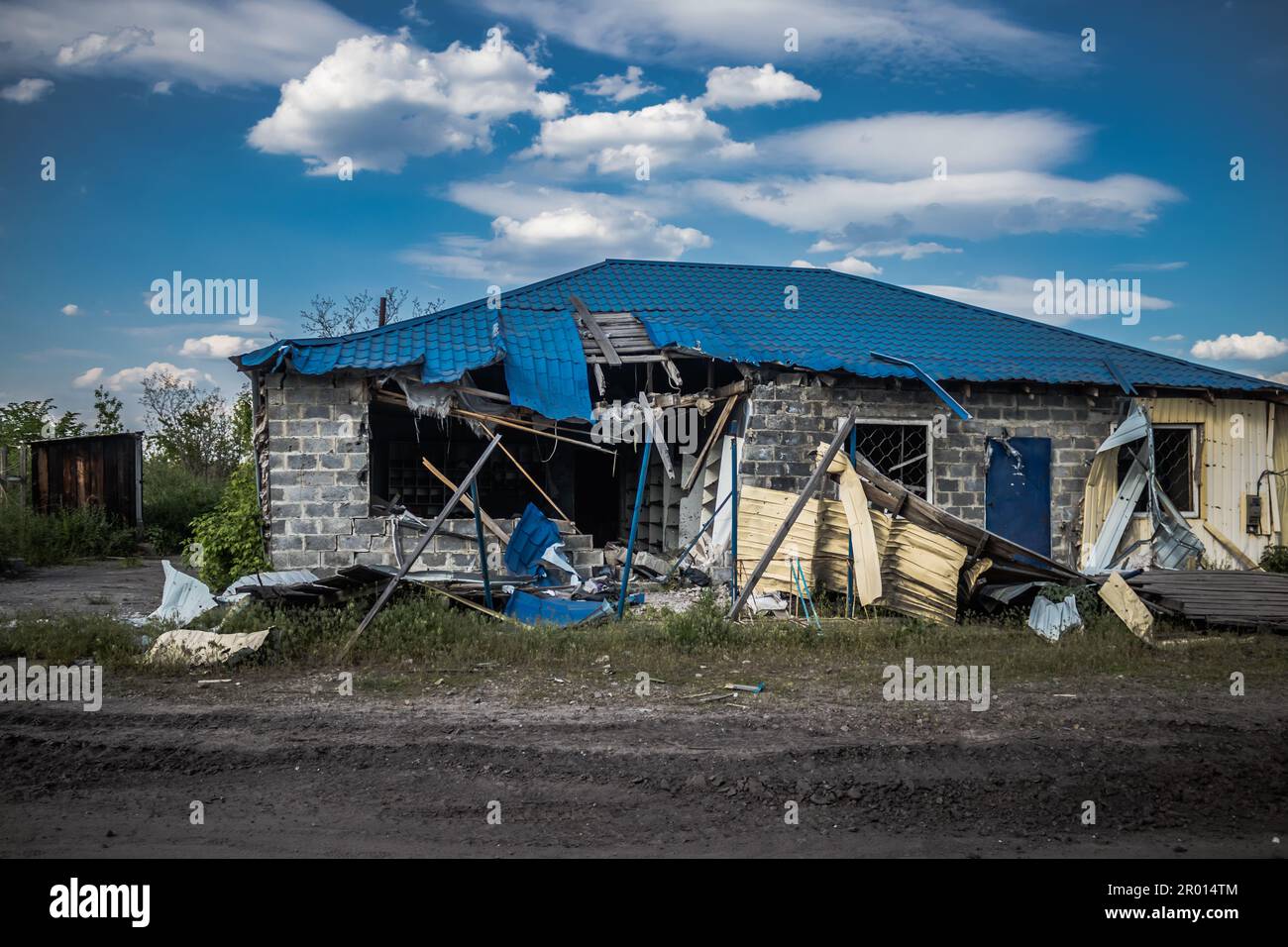 Heavily damaged or destroyed houses in the village of Yampil, Donetsk ...