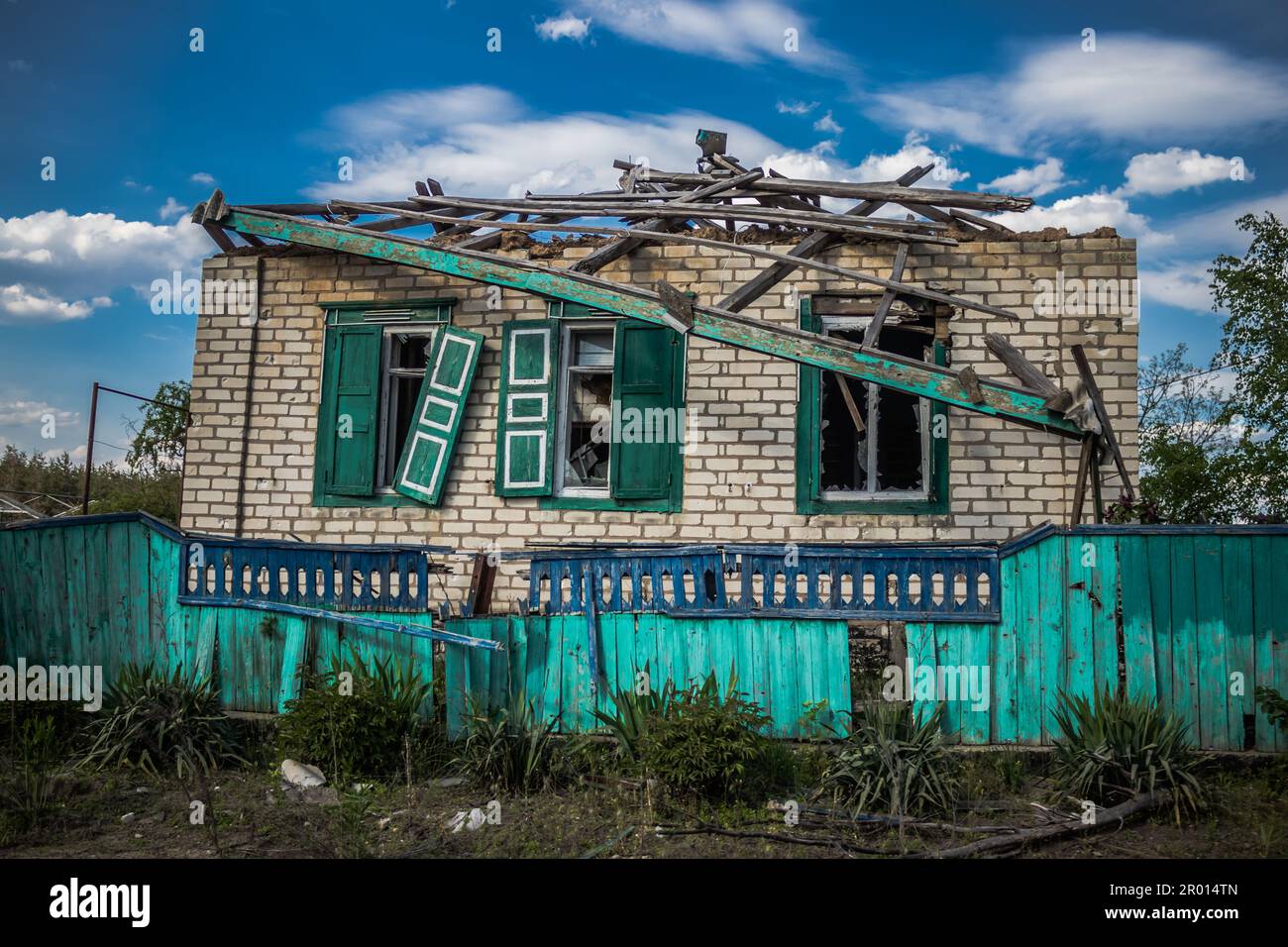 Heavily damaged or destroyed houses in the village of Yampil, Donetsk ...
