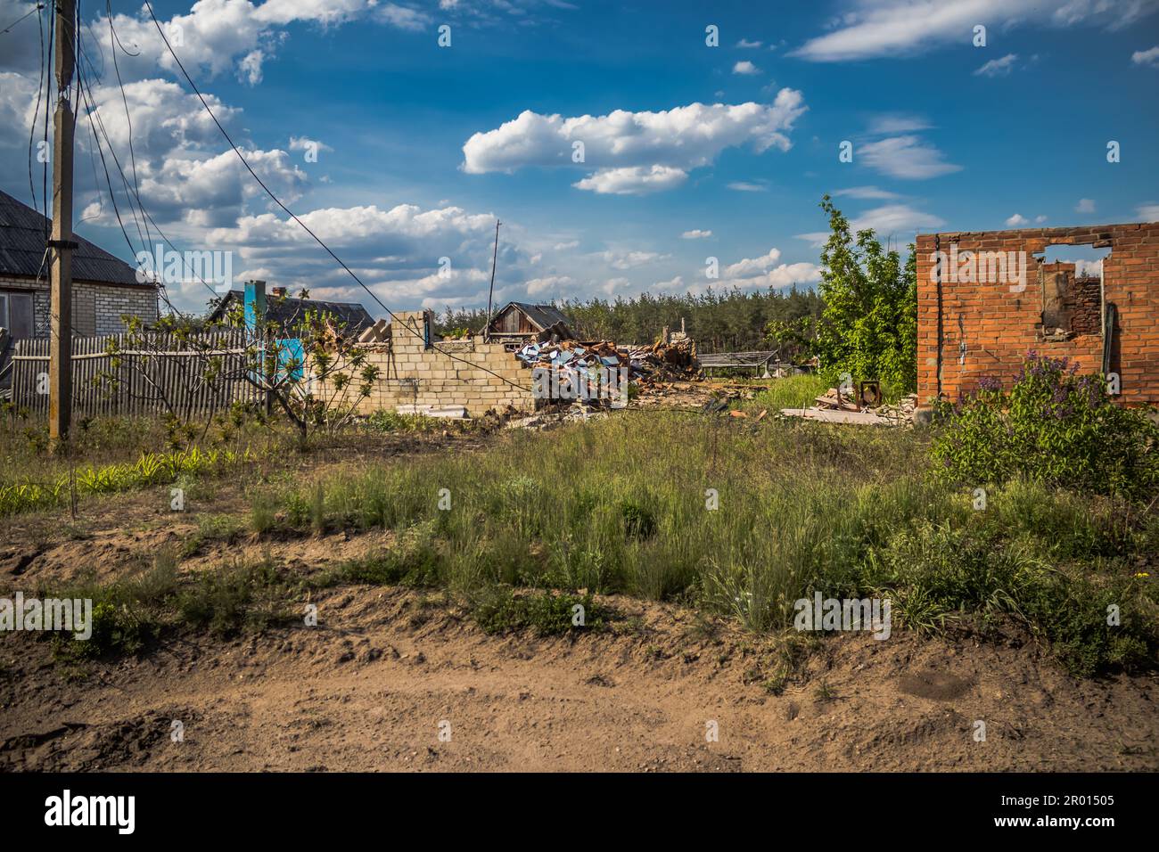 Heavily damaged or destroyed houses in the village of Yampil, Donetsk ...