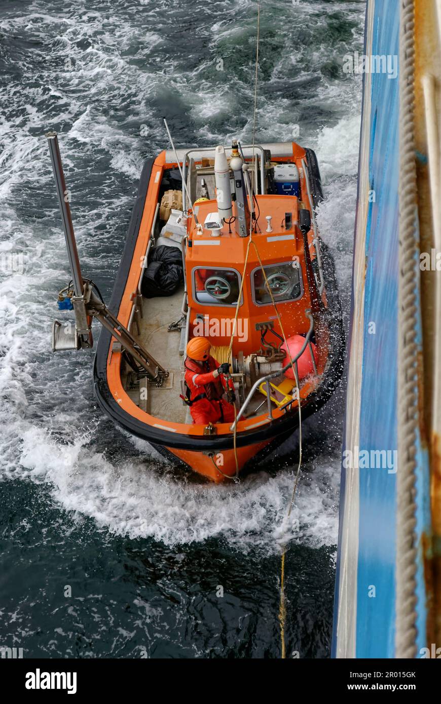 A small Norpower Seismic Workboat being recovered to the Seismic Mother ...