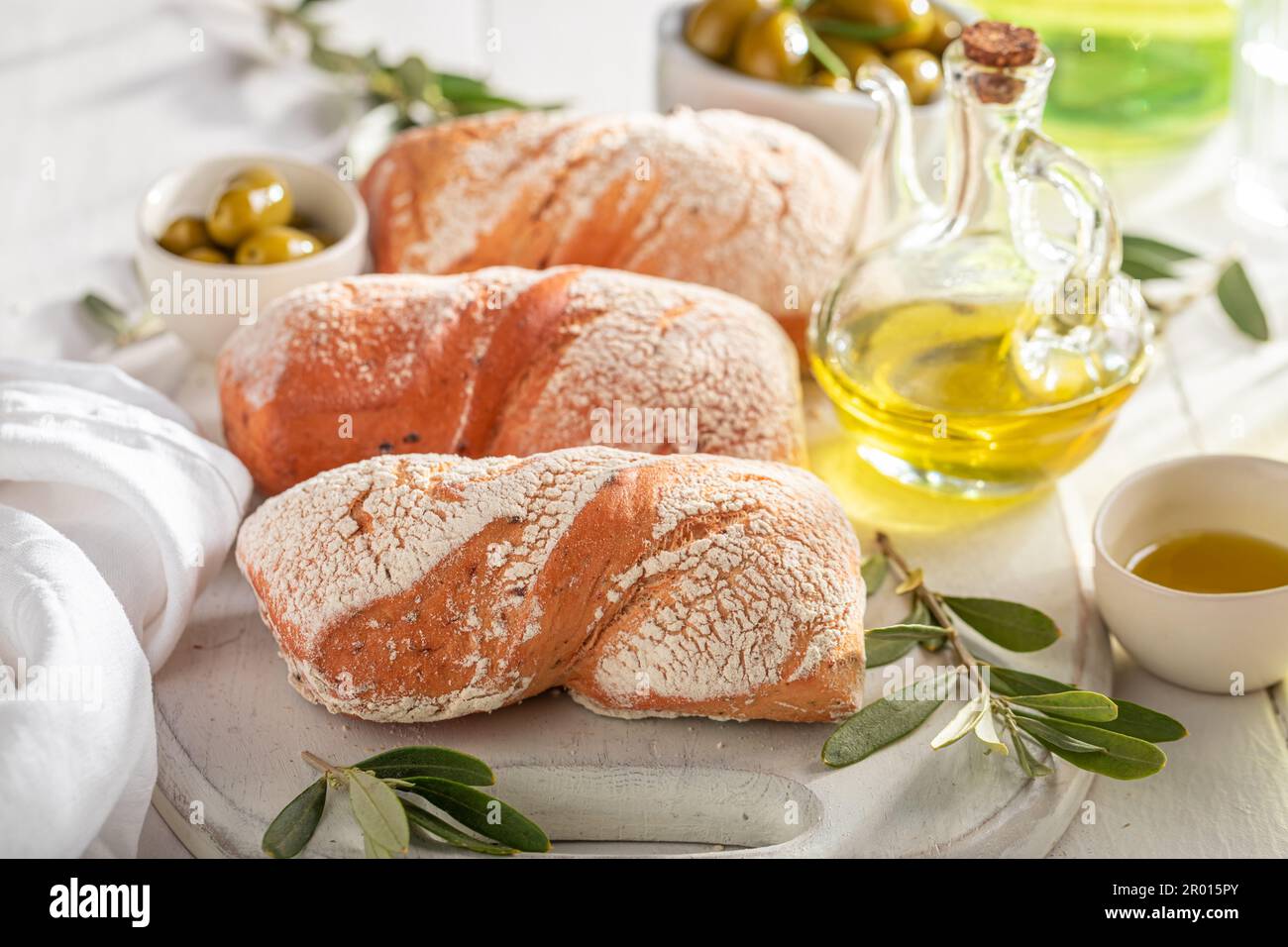 Homemade buns as traditional baked goods in Tuscany. Rolls with green ...