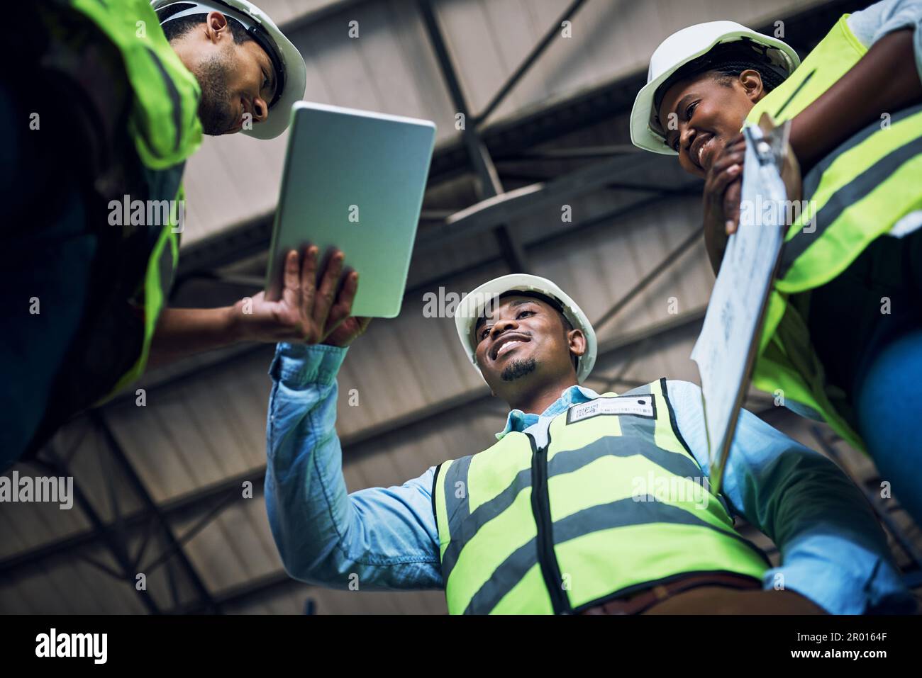Less documents, more getting it done. Low angle shot of a group of ...