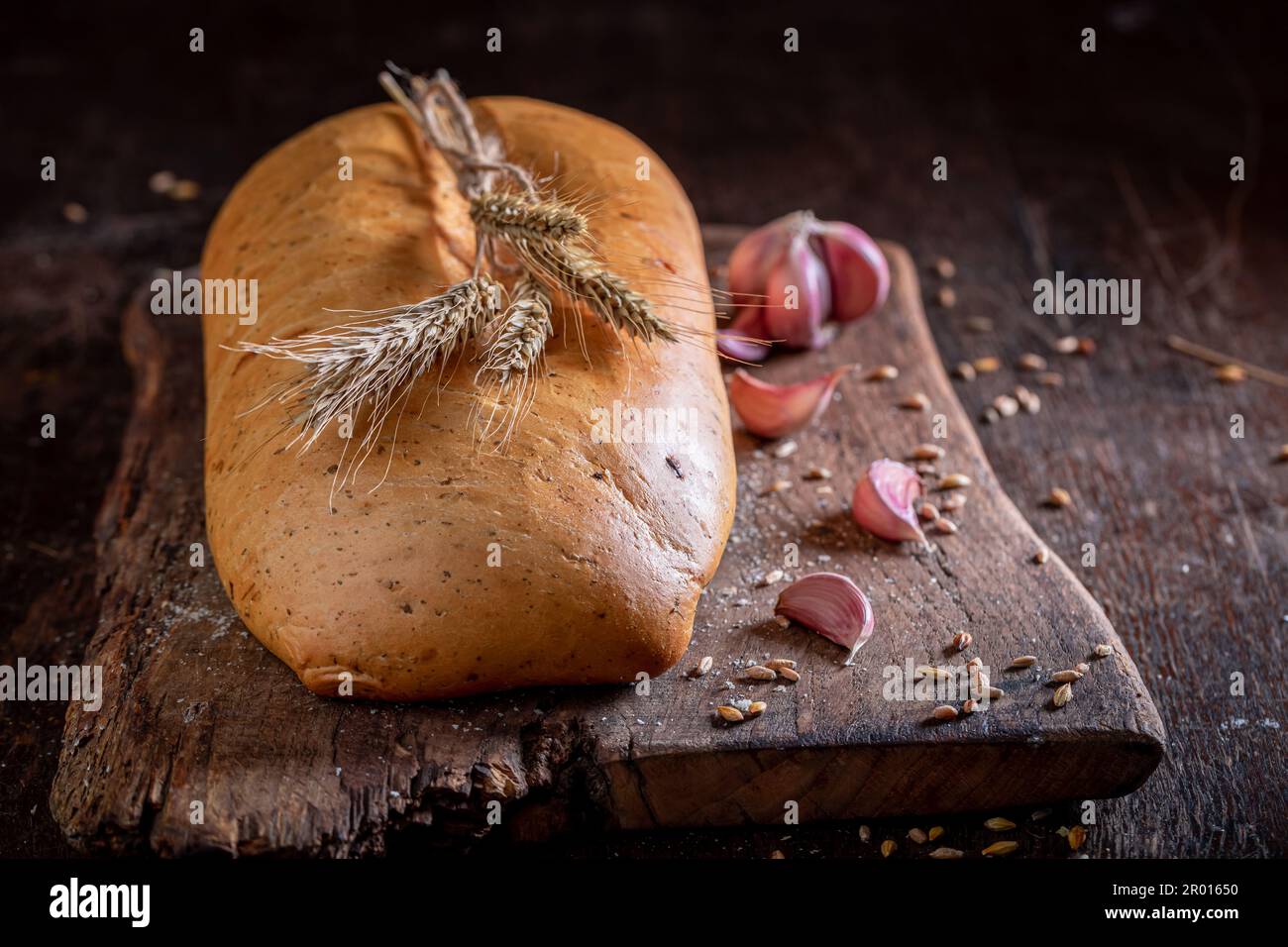 Fresh and cripsy bread seasoning with garlic olive oil. Loaf of bread ...