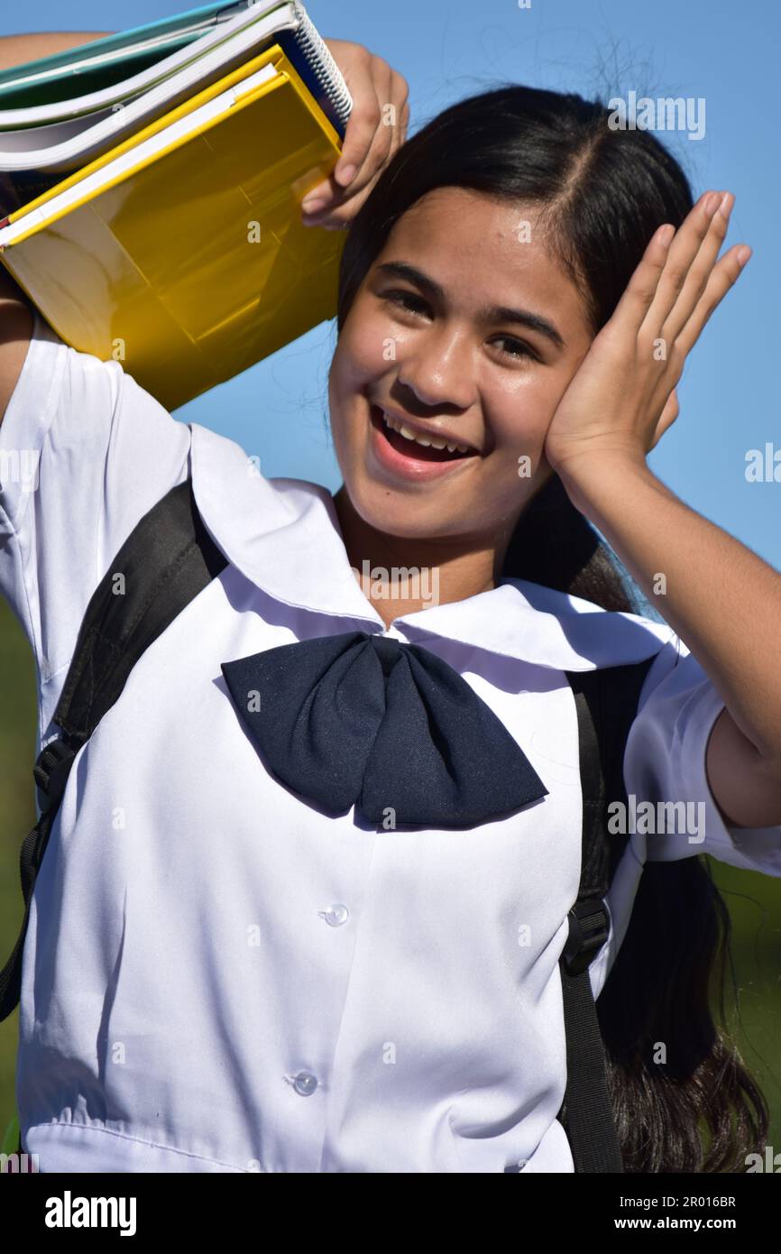 Silly Diverse Female Student Wearing Uniform Stock Photo - Alamy