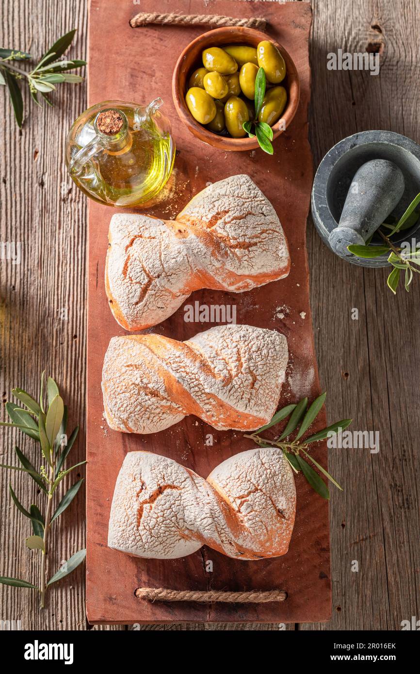 Delicious buns as traditional baked goods in Tuscany. Rolls with green ...