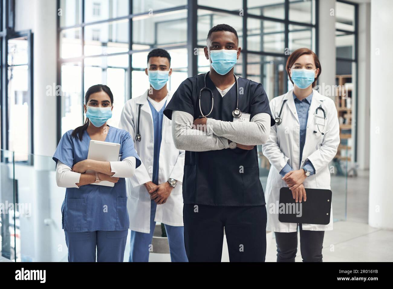 Making sure everyone is safe. a group of doctors and nurses wearing ...
