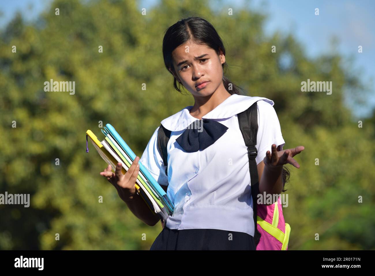 An Undecided Cute Diverse Person Stock Photo - Alamy