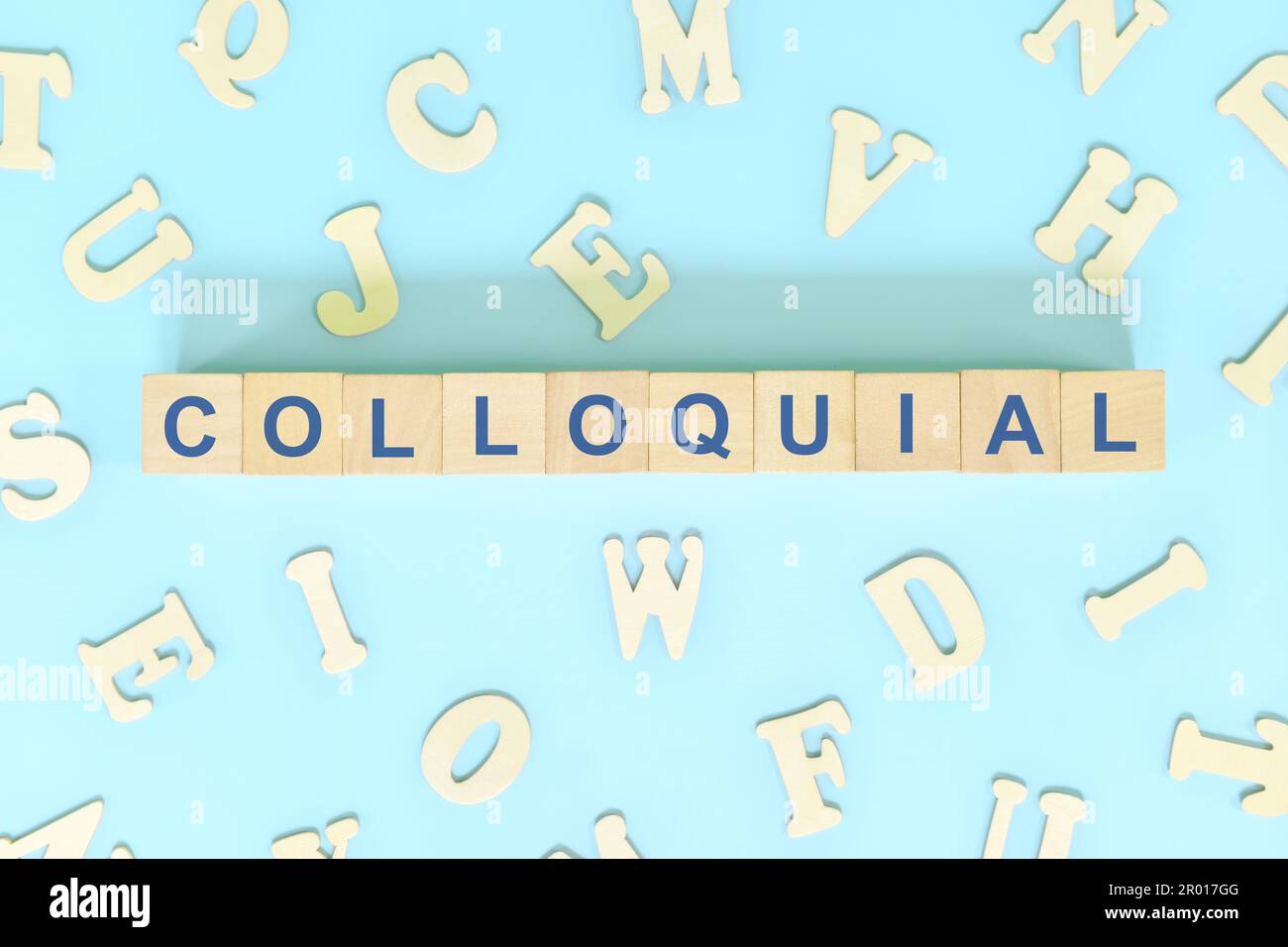 Colloquial language concept. Wooden blocks typography word flat lay in ...