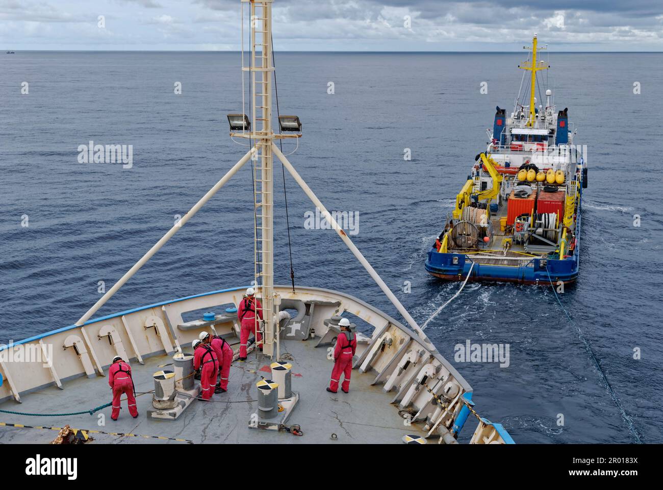 The Maritime Crew of a Seismic Research Vessel making fast the Tow rope ...