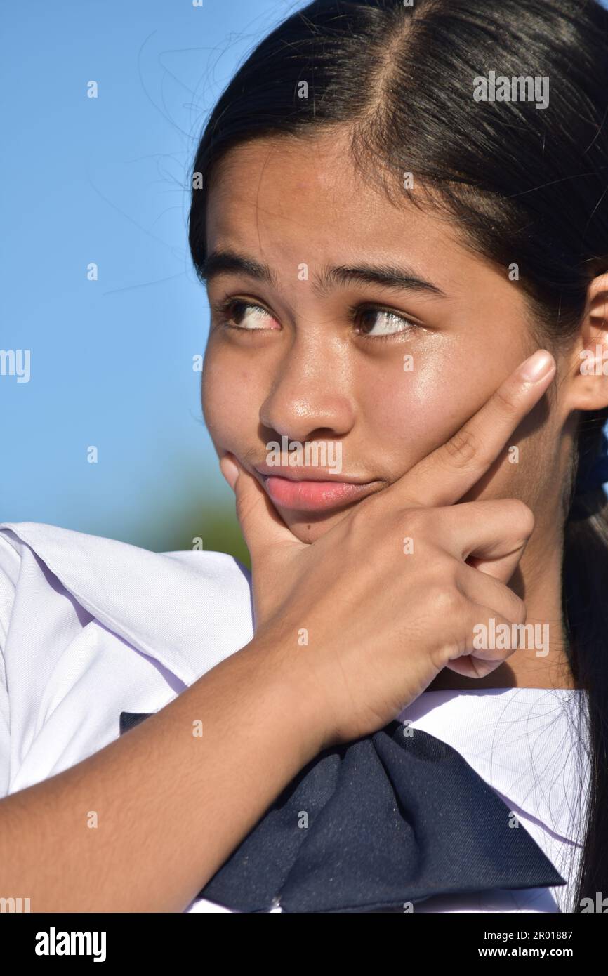 Pretty Filipina Female Thinking Face Closeup Stock Photo - Alamy