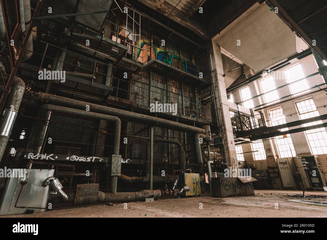 Old and rusty abandoned industrial plant, forgotten historical factory ...