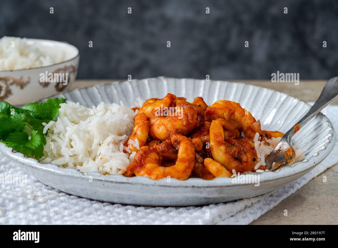 Tamarind prawn curry with rice Stock Photo - Alamy