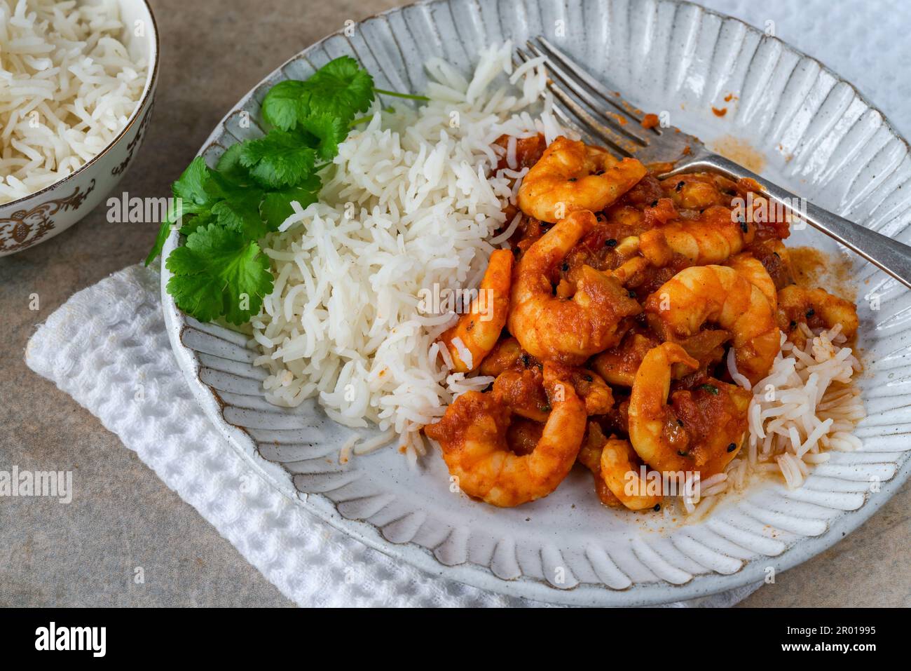 Tamarind prawn curry with rice Stock Photo - Alamy