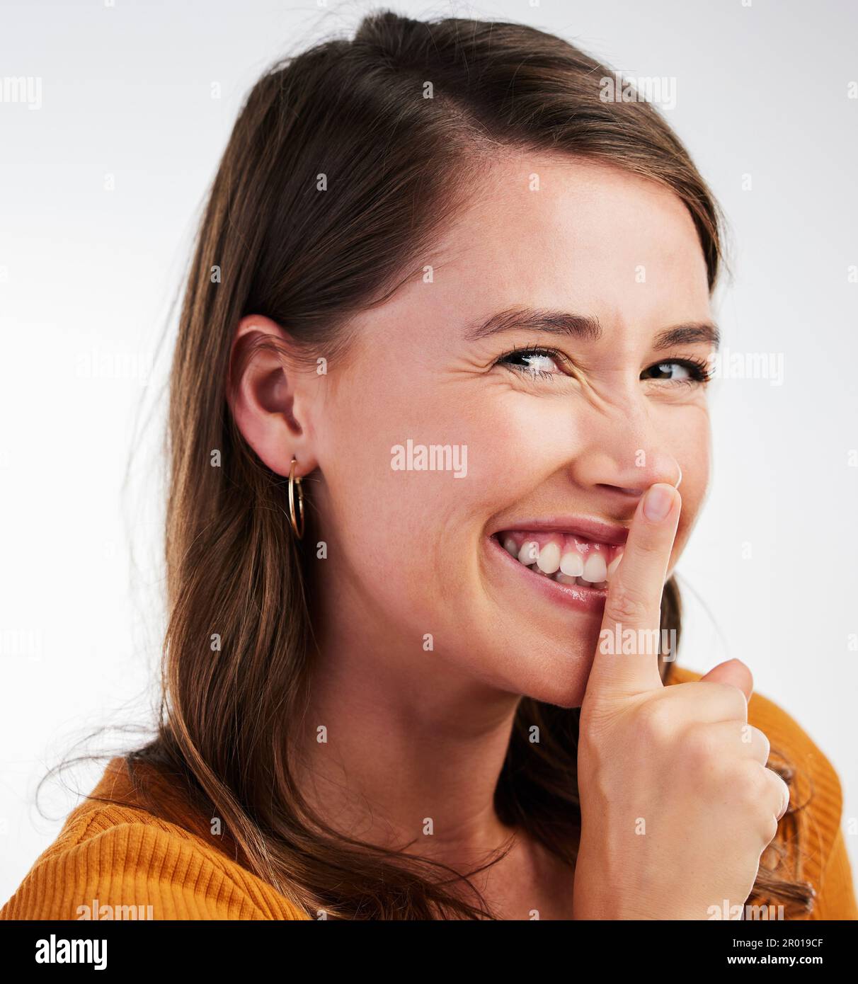 Person signalling to be quiet hi-res stock photography and images - Alamy