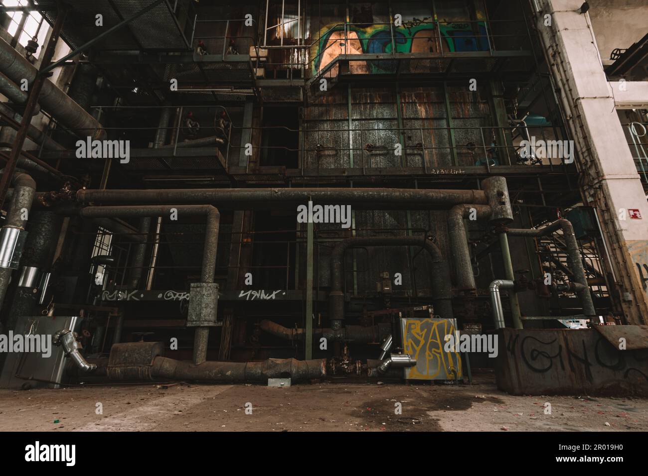 Old and rusty abandoned industrial plant, forgotten historical factory ...