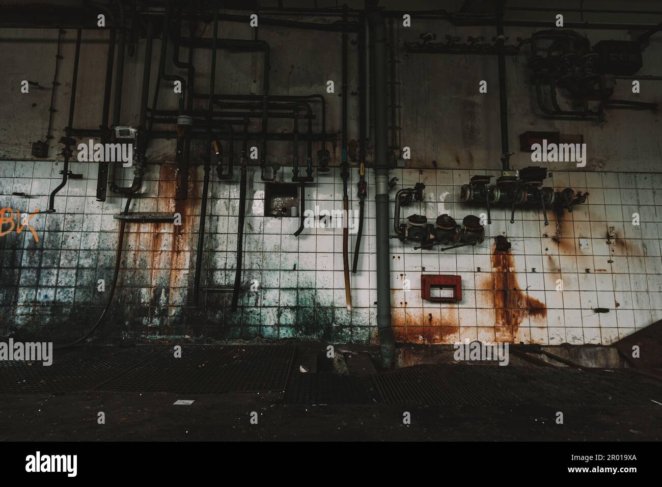 Old and rusty abandoned industrial plant, forgotten historical factory ...